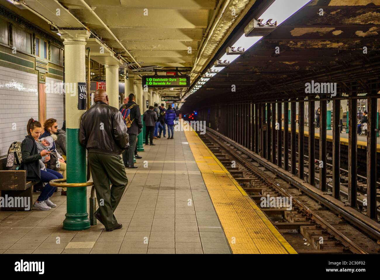 Passengers waiting for subway, Wall Street Station, New York Metro ...