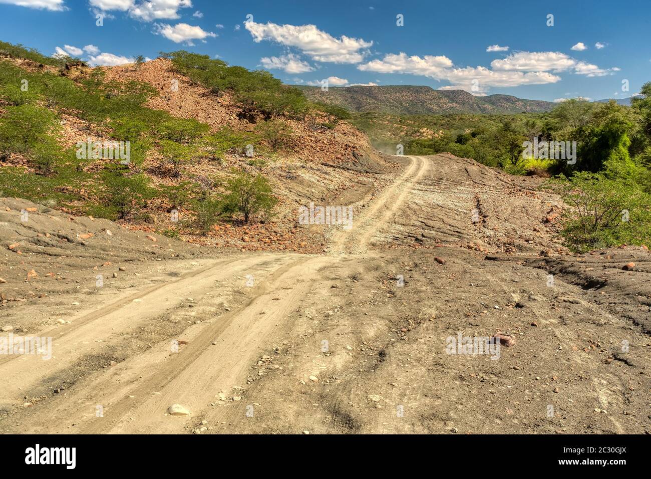 endless empty sand road in fantastic central Namibia desert landscape ...
