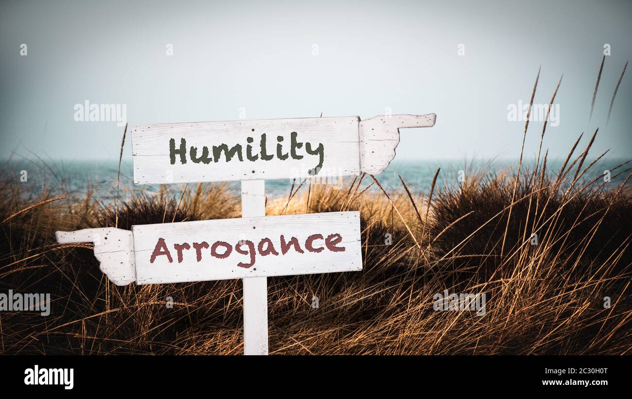 Street Sign to Humility versus Arrogance Stock Photo - Alamy