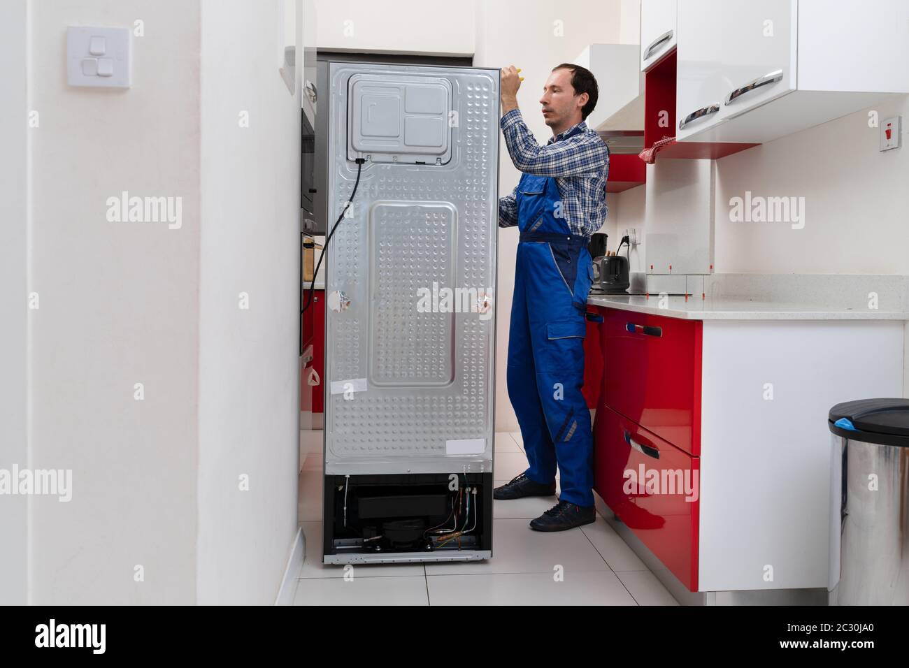 Broken refrigerator hi-res stock photography and images - Alamy