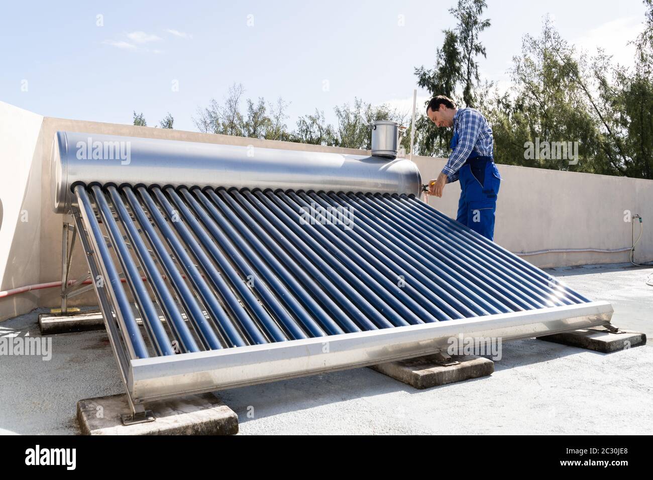 Solar water heater install hi-res stock photography and images - Alamy