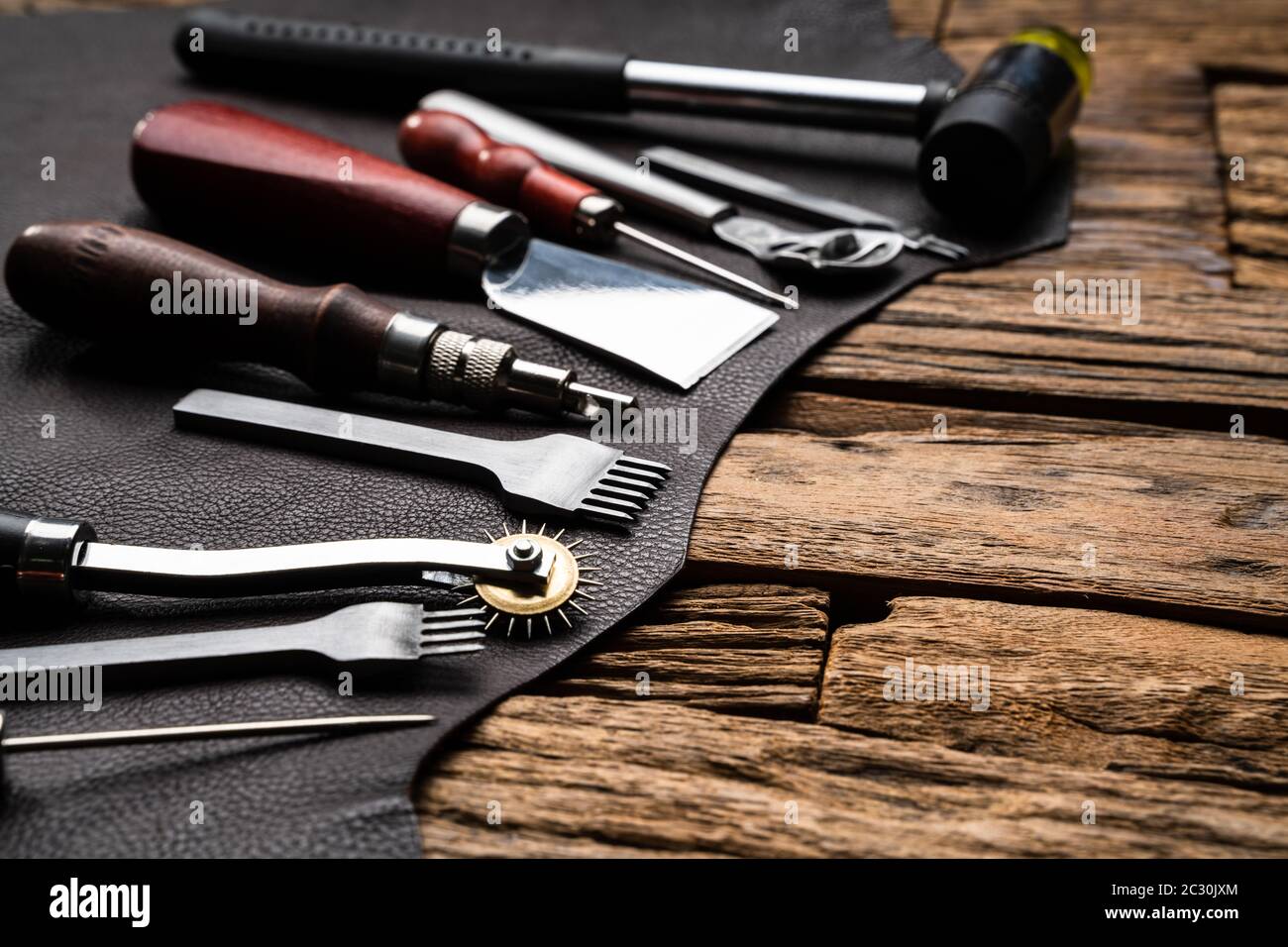 Leather Craft Tools On Desk In Tailoring Workshop Stock Photo - Alamy