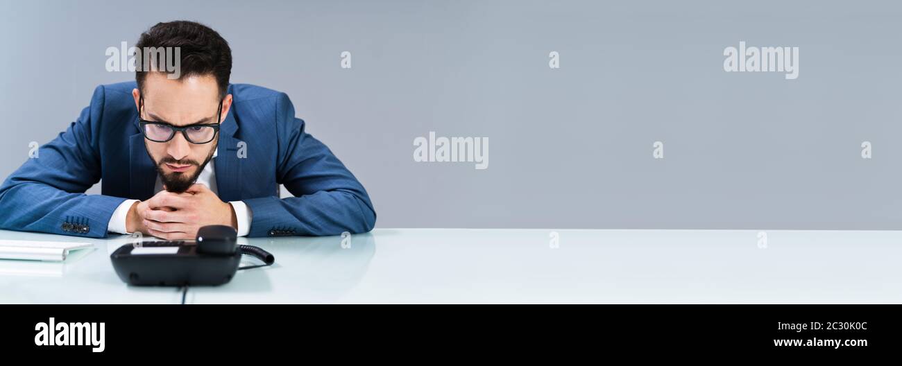 Man on telephone waiting landline hi-res stock photography and images ...