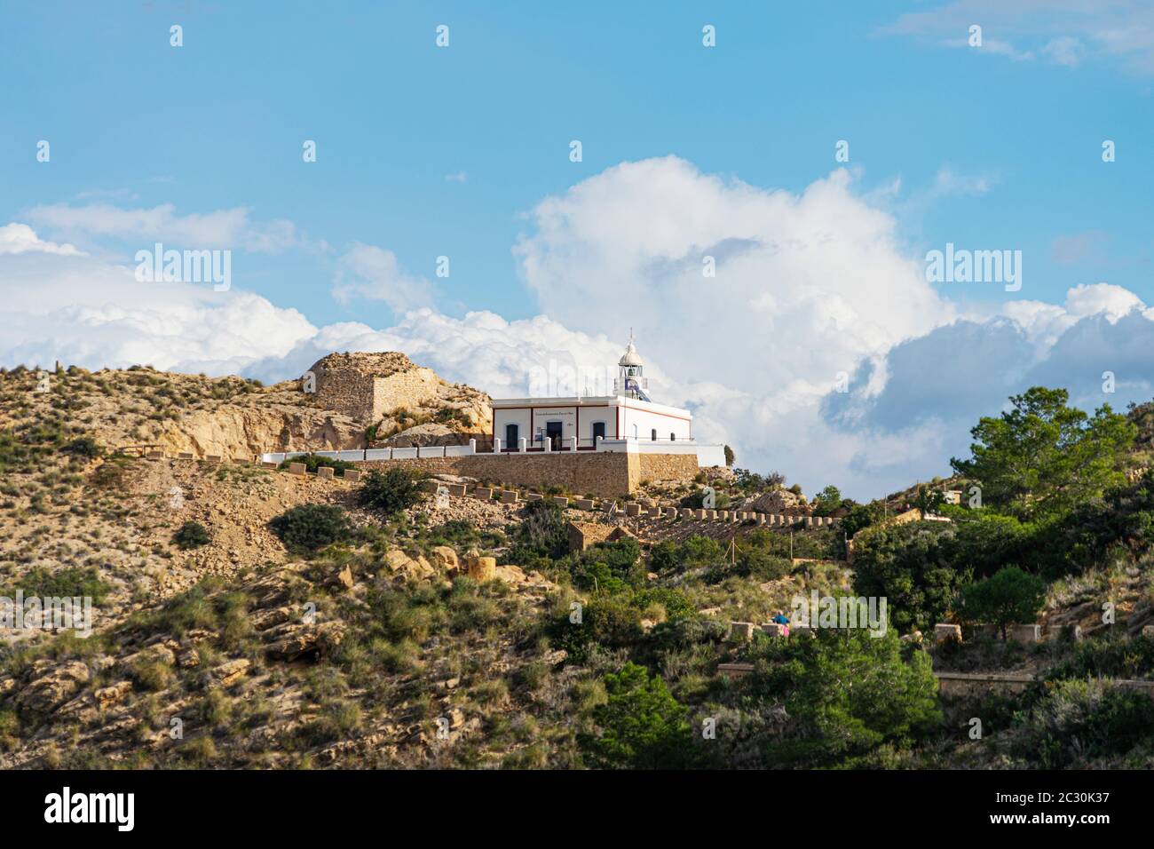 Faro de l'Albir. View to Albir lighthouse at the mediterranean sea in ...