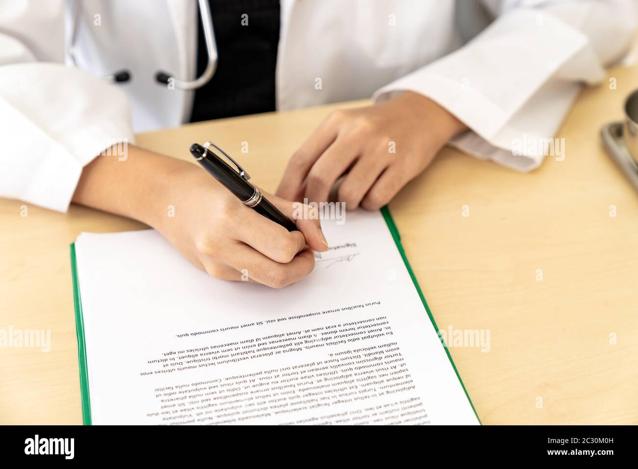 Closeup confident female doctor medical professional sitting in ...
