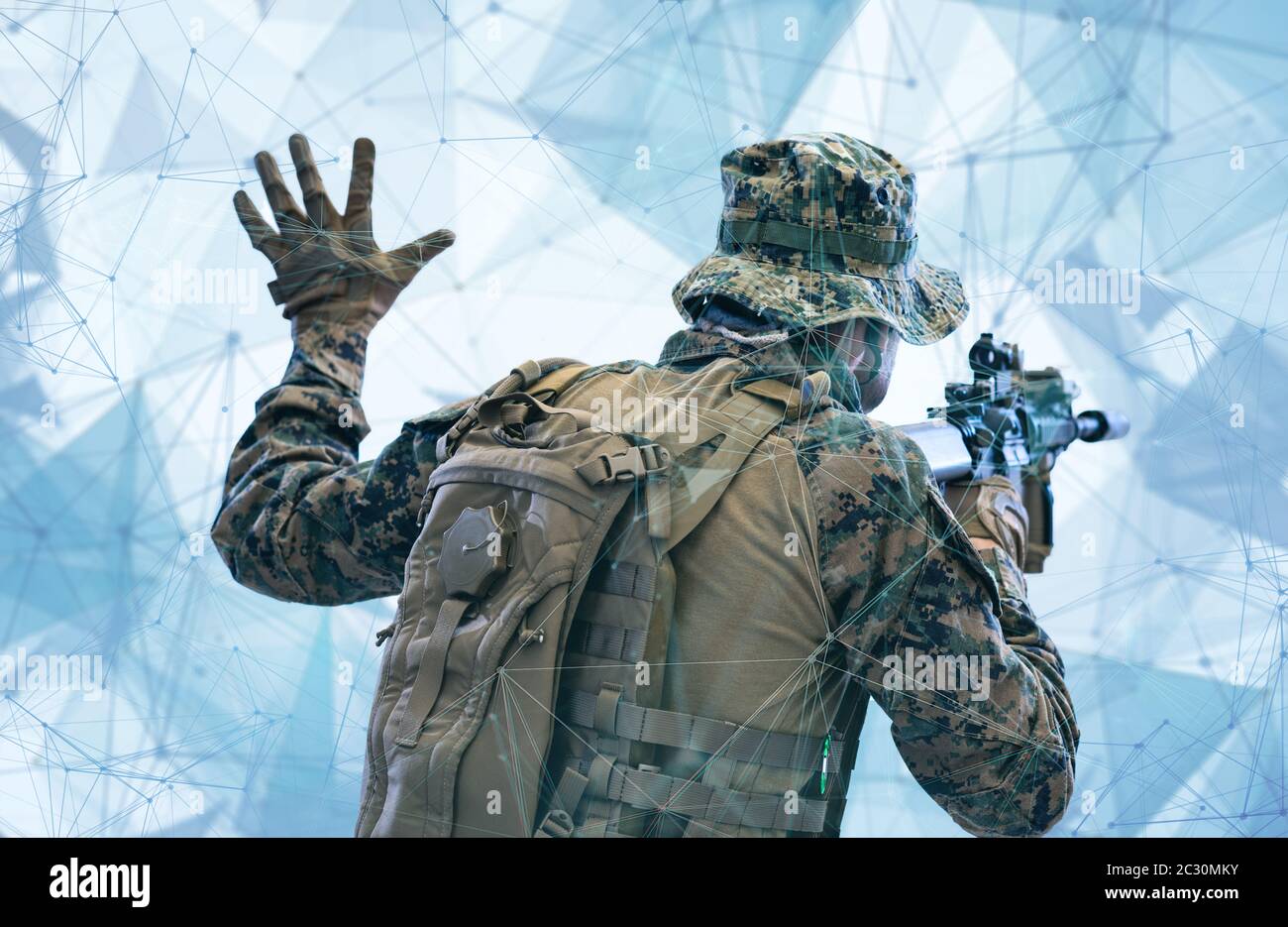 soldier in action giving comands to team by hand sign Stock Photo - Alamy