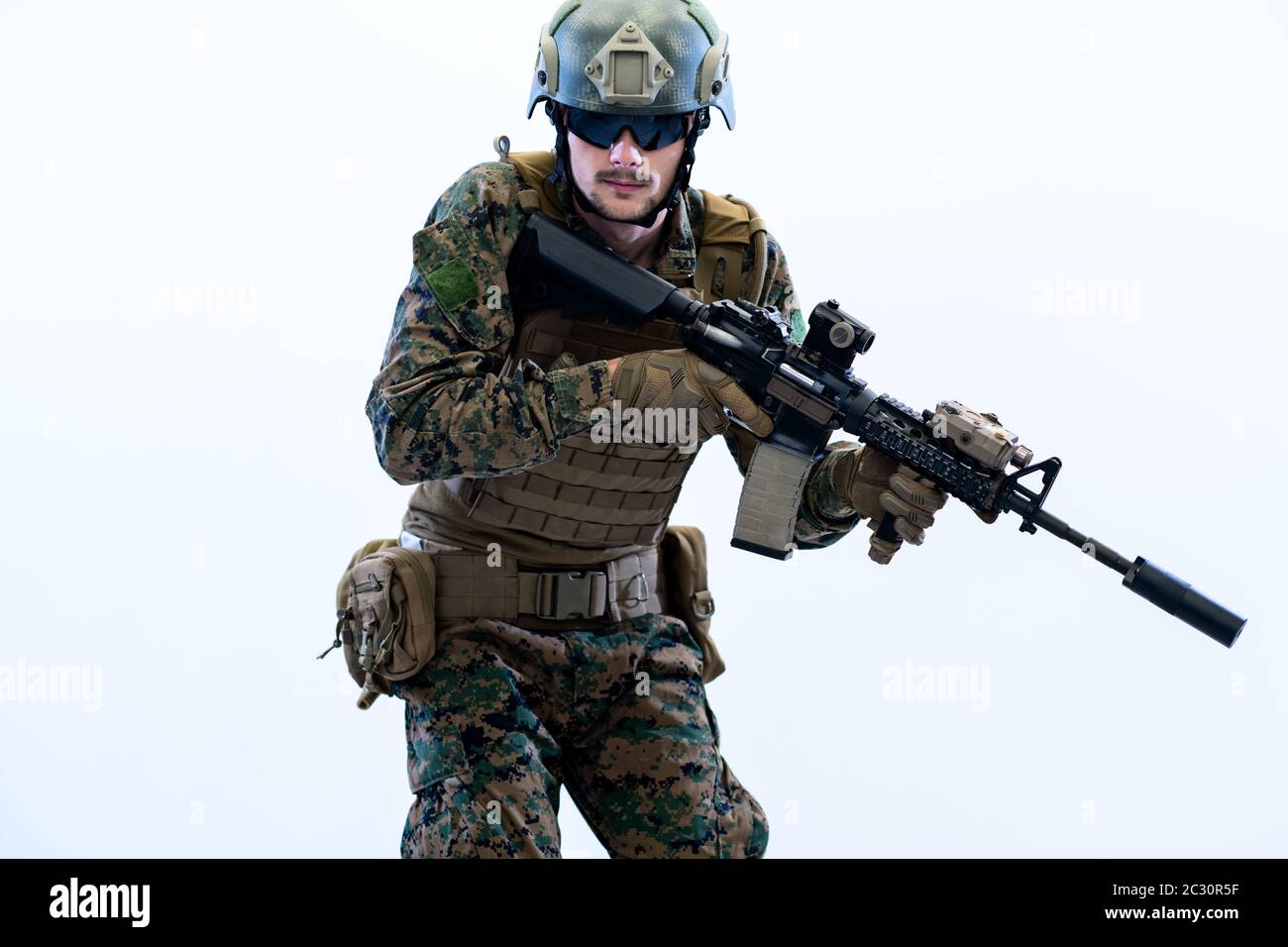soldier in action aiming laseer sight optics Stock Photo - Alamy