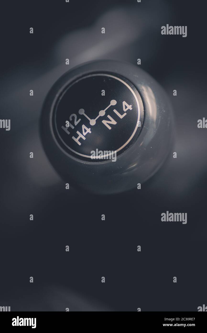 Close up image of a 4wd car's 4x4 shifter Stock Photo - Alamy