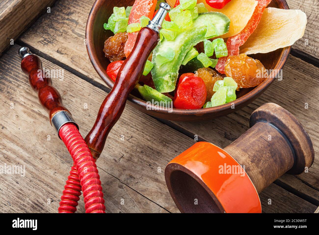 Details of oriental hookah and shisha tobacco with candied fruit ...