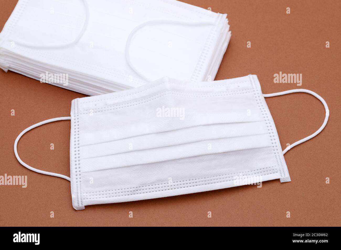 white air protection mask on the color background Stock Photo - Alamy