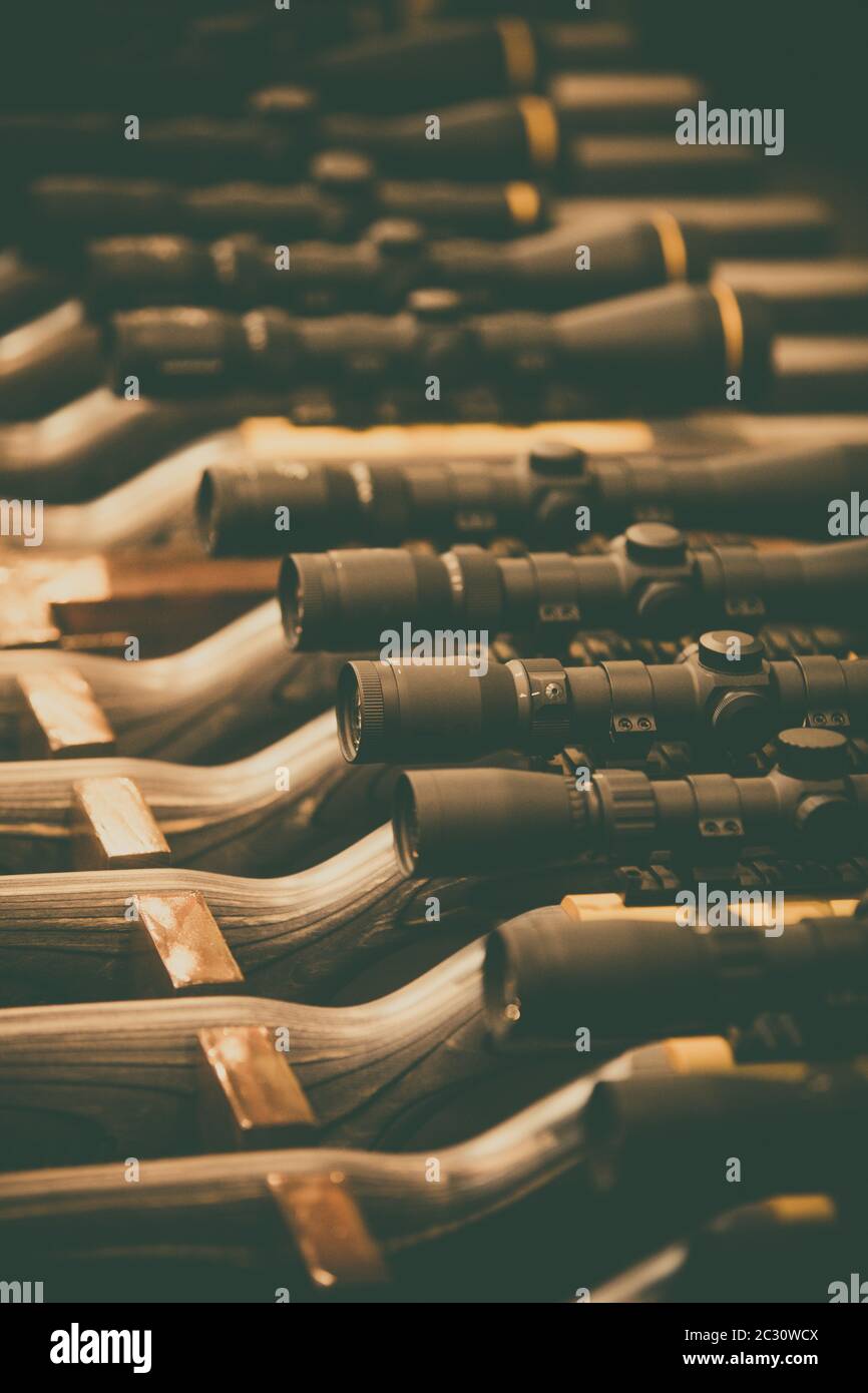Close up shot of some rifles with scopes Stock Photo - Alamy