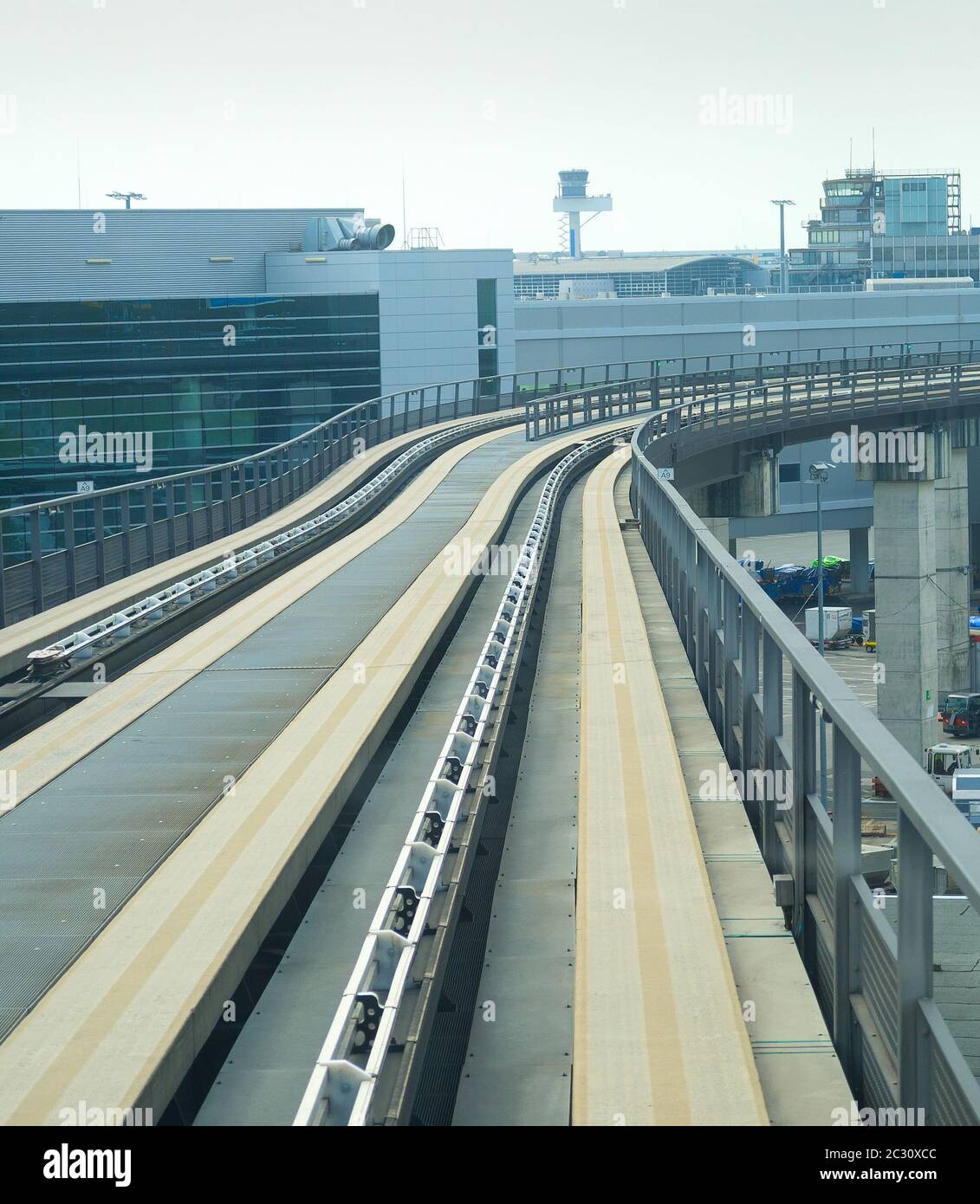 Railroad modern transit train airport Stock Photo - Alamy