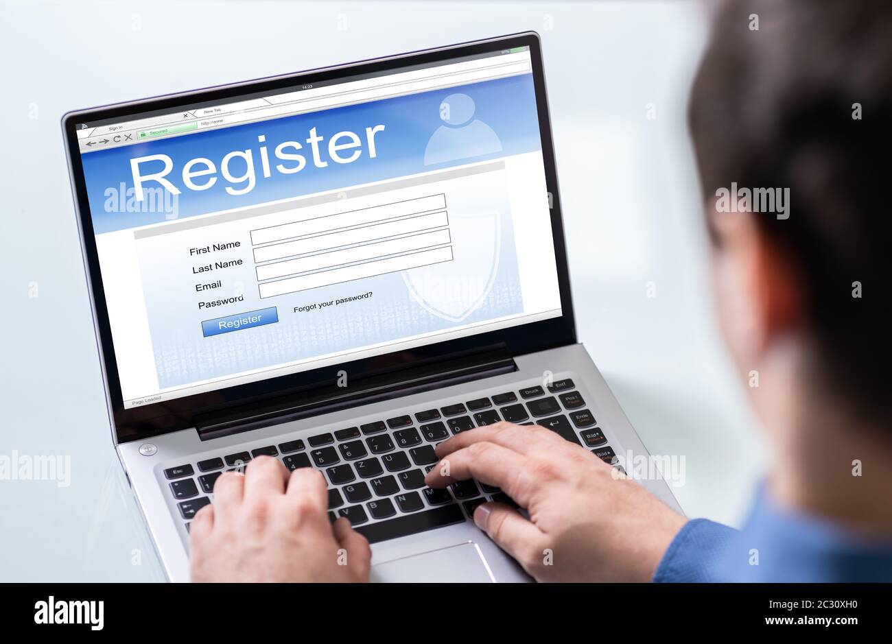 Businessman's Hand Filling Online Registration Form On Laptop Stock ...