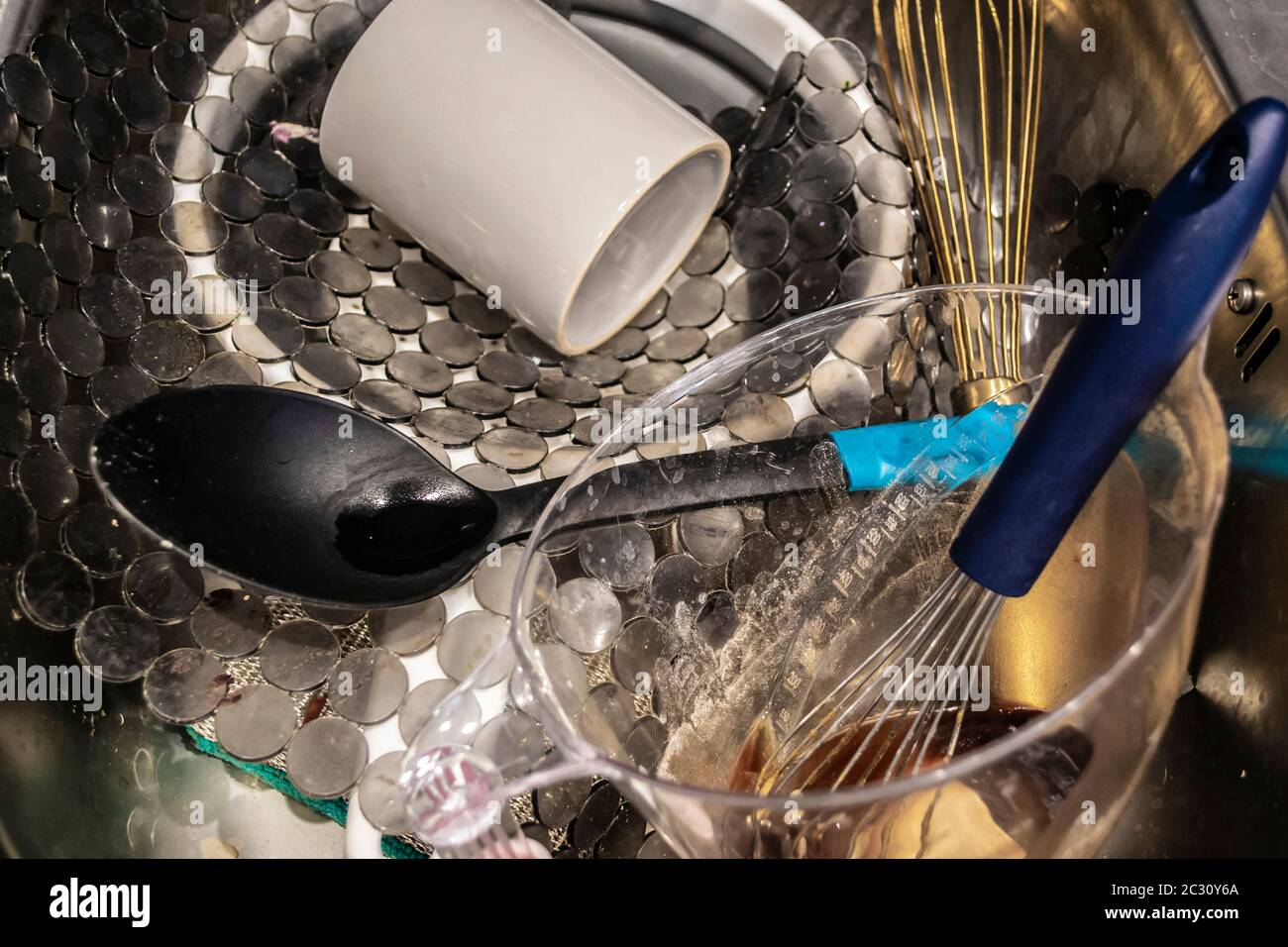 Washing up in a sink Stock Photo - Alamy
