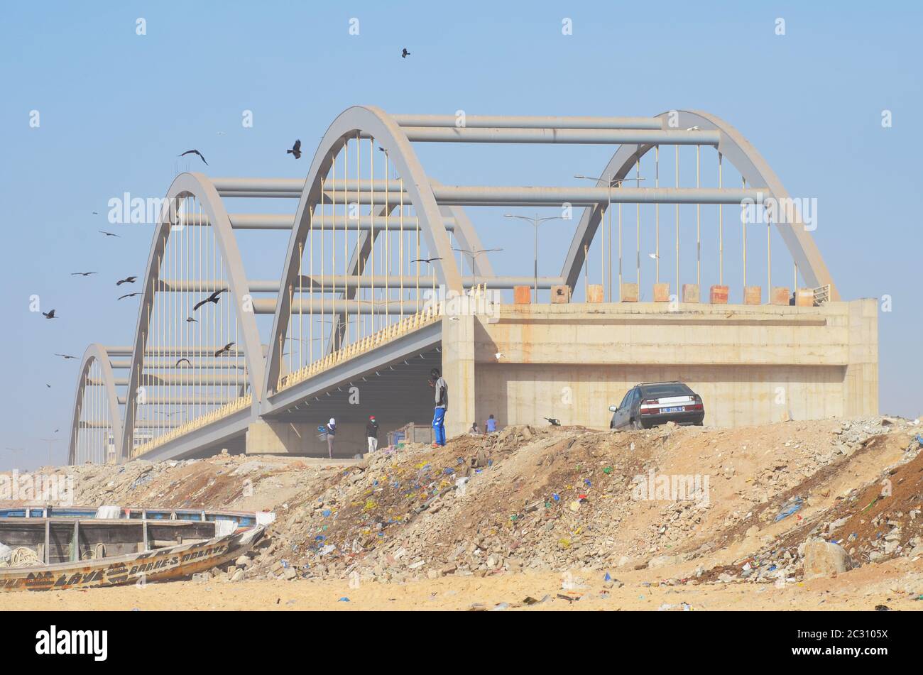 An unfinished highway bridge in Cambérène coastal neighbourhood, Dakar ...