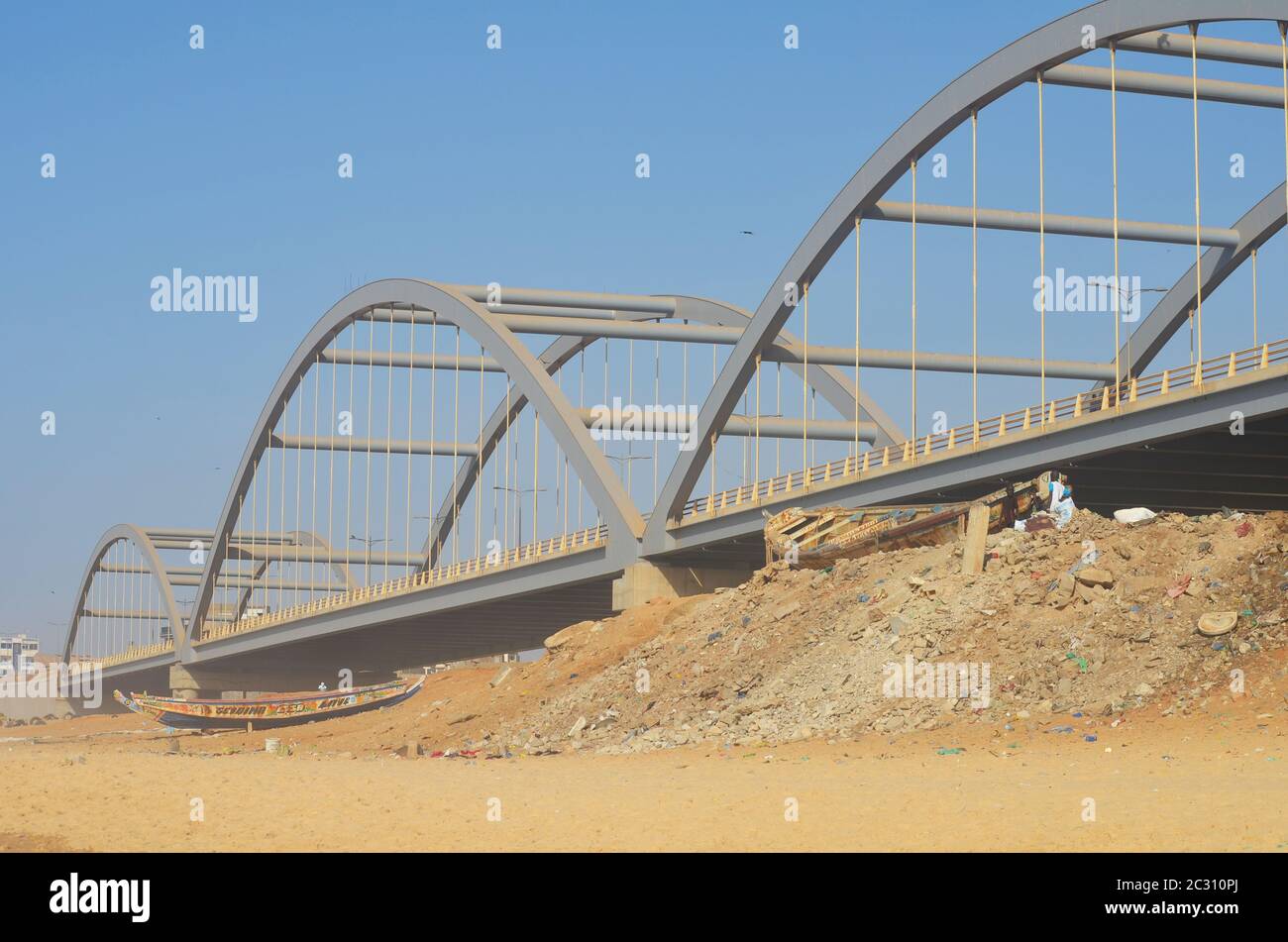 An unfinished highway bridge in Cambérène coastal neighbourhood, Dakar ...