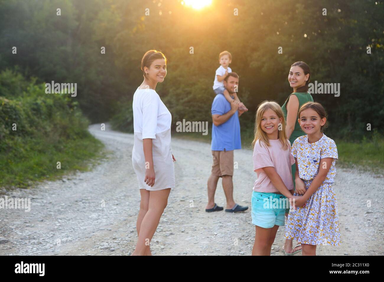 Parents with children in countryside outdoors Stock Photo - Alamy
