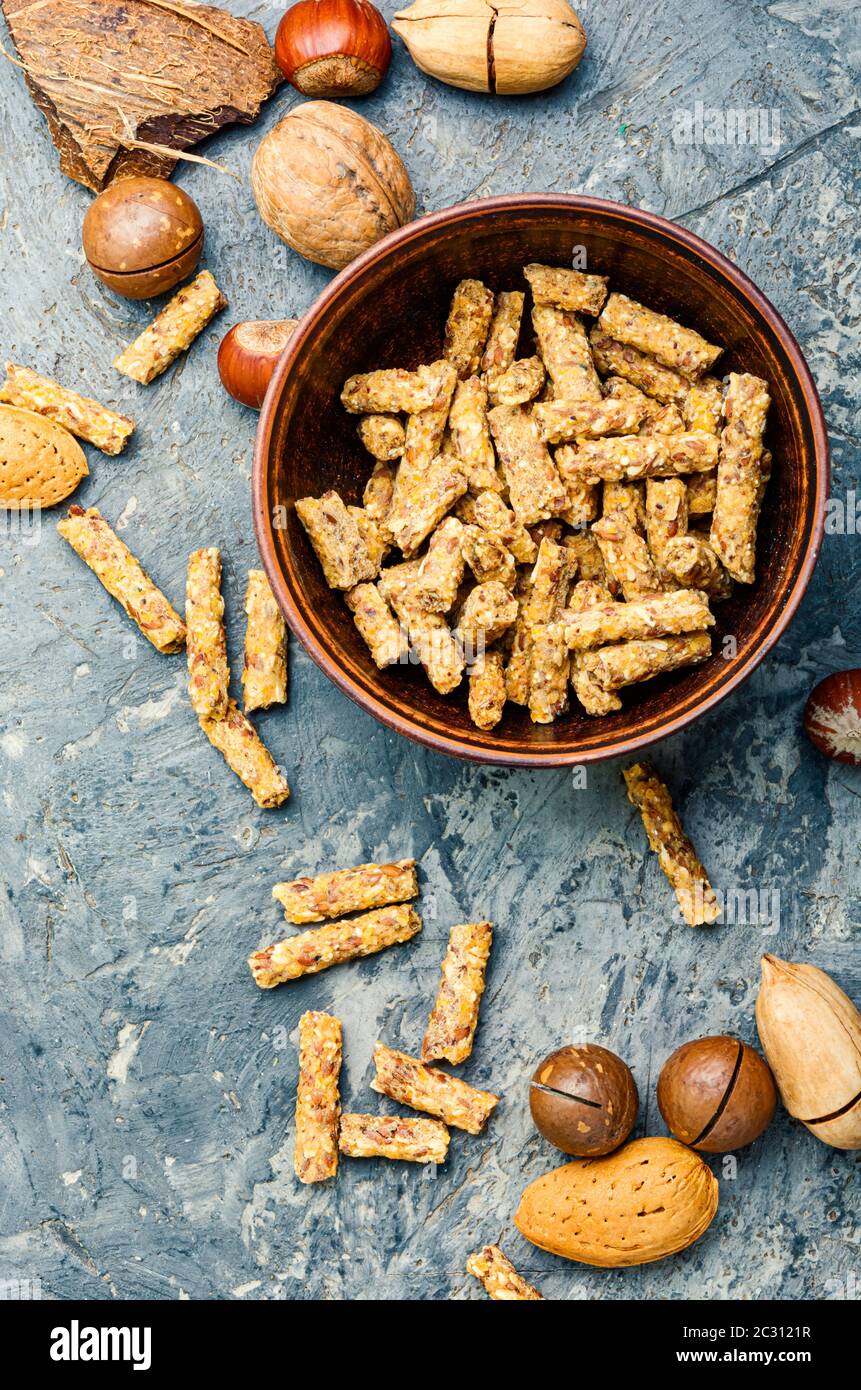 Organic uncooked granola cereal with mixed nuts Stock Photo - Alamy