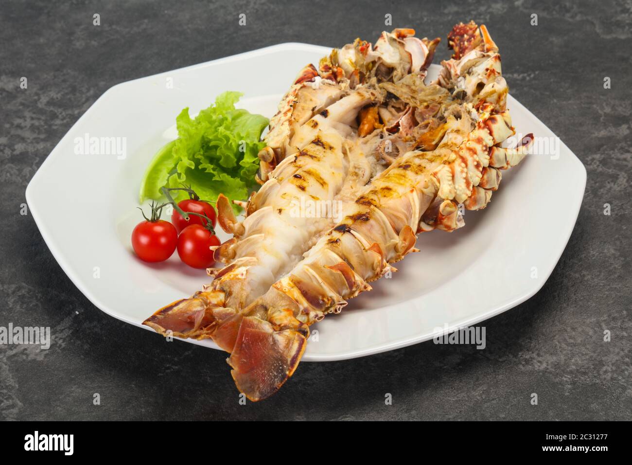 Grilled crayfish in the plate served salad Stock Photo - Alamy
