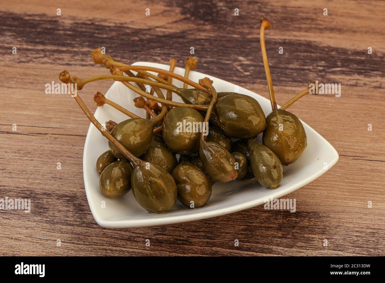 Tasty Caper berries in the bowl Stock Photo - Alamy