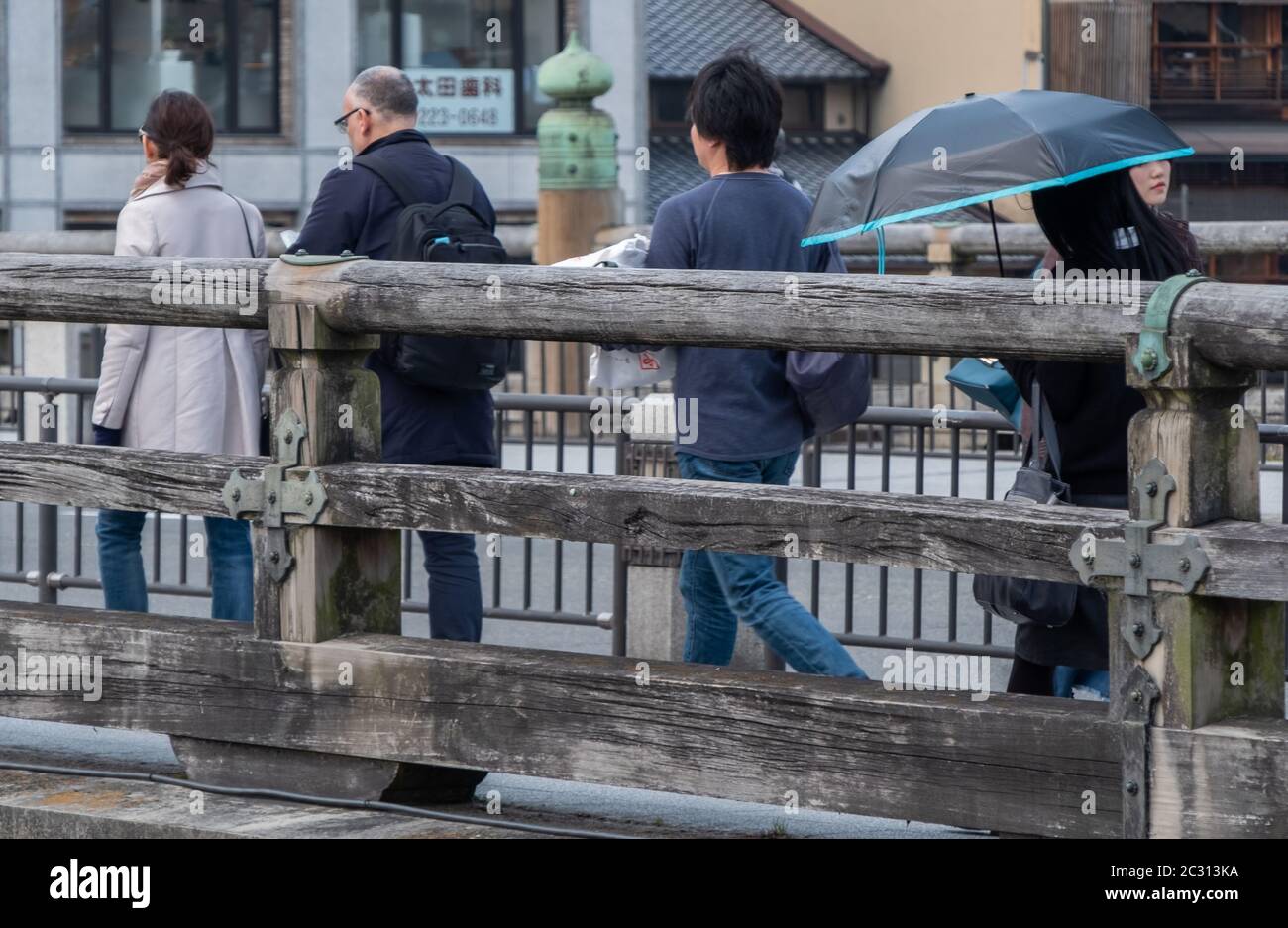 Pedestrian walking at Sanjo Bridge, Kyoto, Japan Stock Photo - Alamy