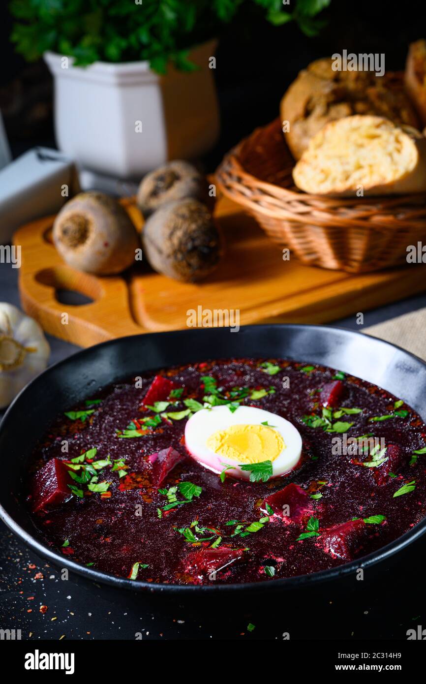 Delicious beetroot borscht with egg Stock Photo - Alamy