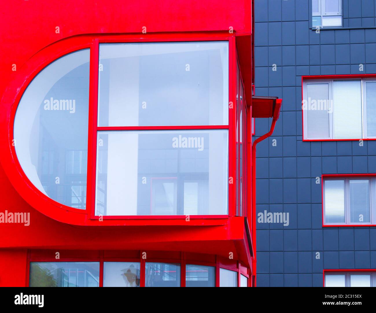 facade of a gray painted building with windows. The concept of a modern ...