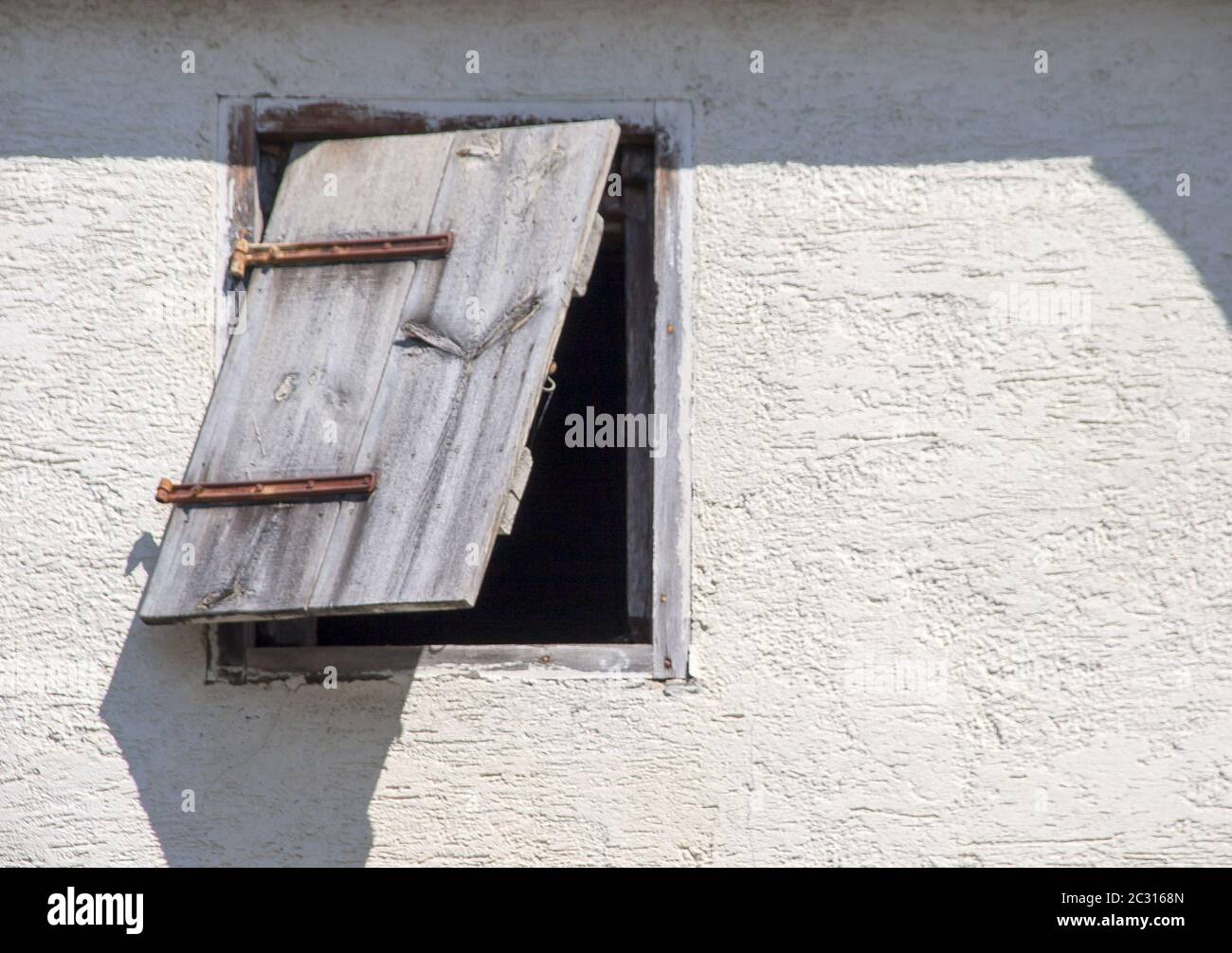 Window shutter defect Stock Photo - Alamy
