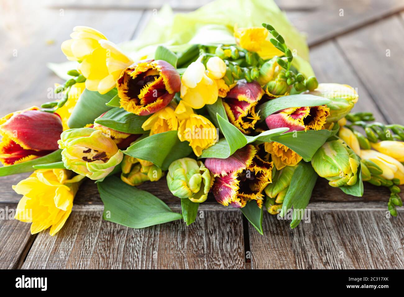 Bunch of fresh spring flowers in yellow Stock Photo - Alamy