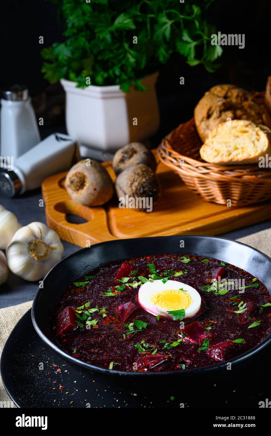 Delicious beetroot borscht with egg Stock Photo - Alamy