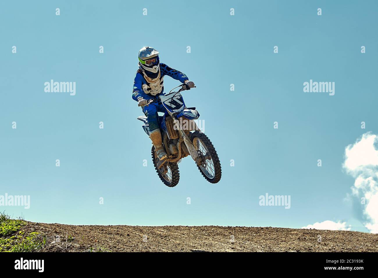 Silhouette motocross racer jumping on hi-res stock photography and ...