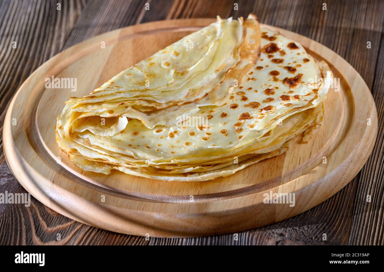 Homemade crepes on wooden board Stock Photo - Alamy