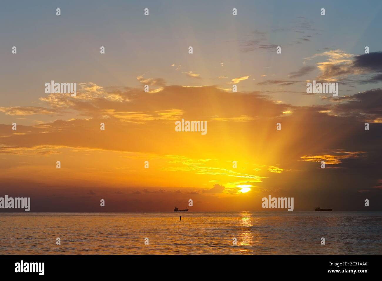 Beautiful sunrise over stormy hi-res stock photography and images - Alamy