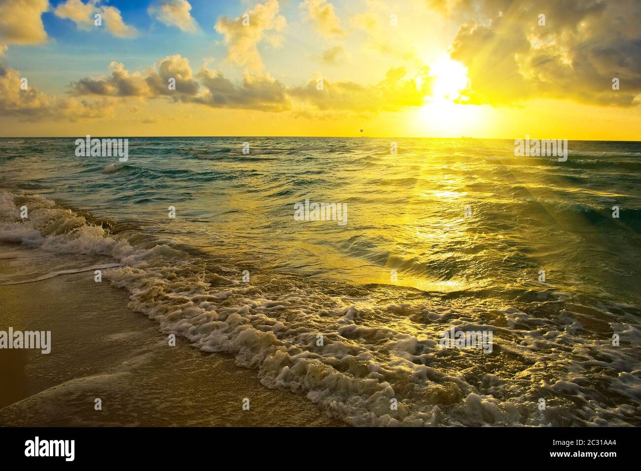 Sunrise over ocean Stock Photo - Alamy