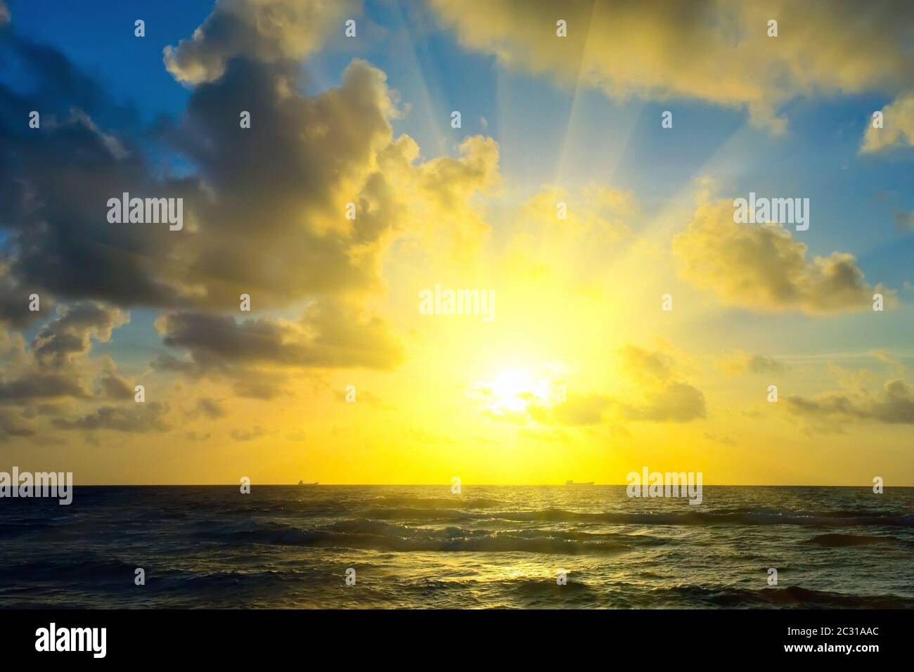 Sunrise over ocean Stock Photo - Alamy