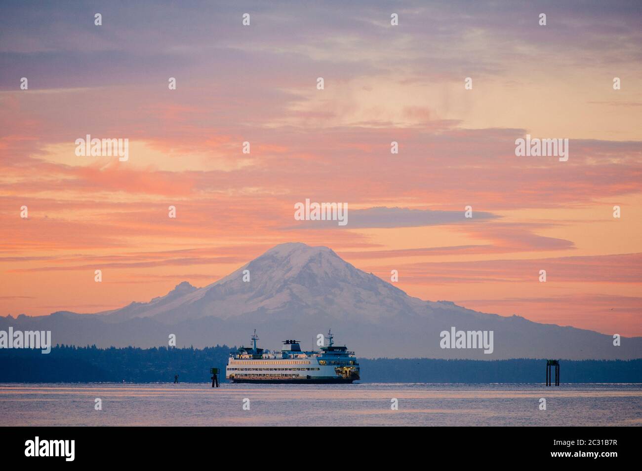 Ferry in Puget Sound and Mount Rainier at sunset, Washington, USA Stock ...