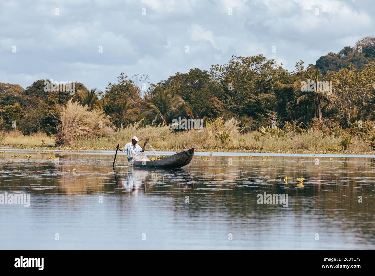 Native Malagasy fishermen fishing on river, Madagascar Stock Photo - Alamy