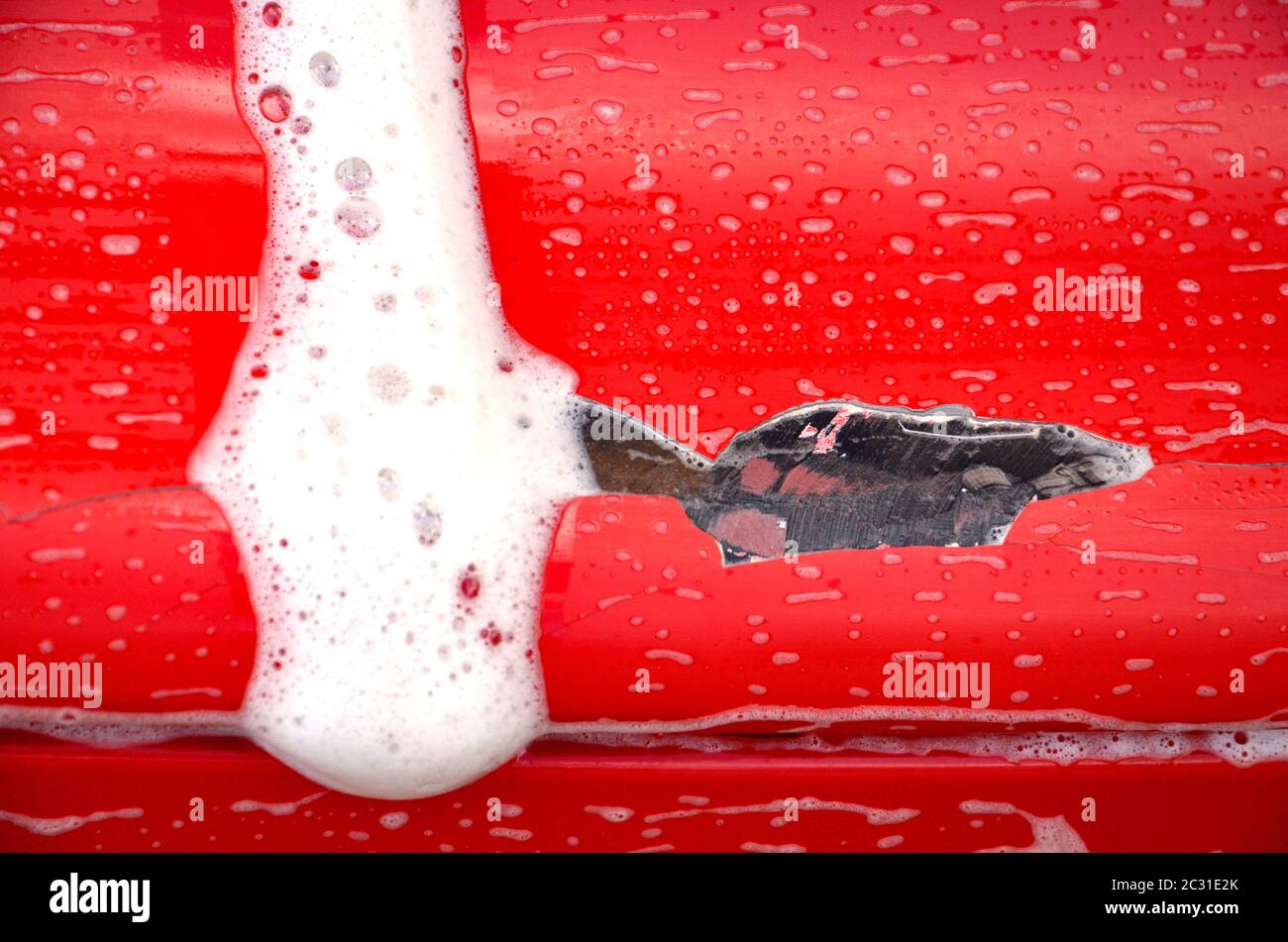 washing red car outdoor, image of a Stock Photo - Alamy