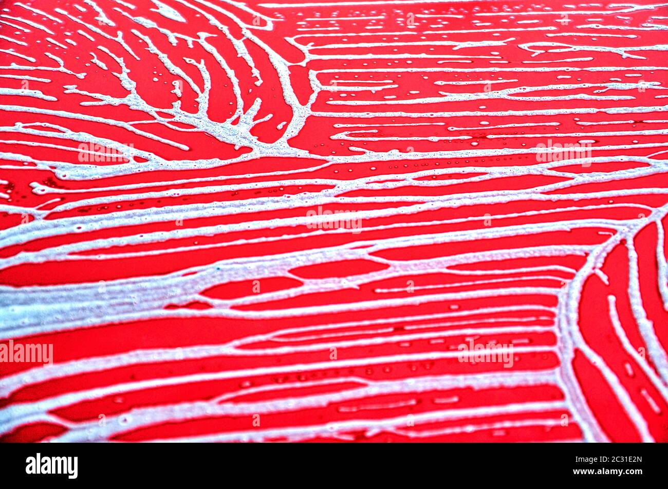 washing red car outdoor, image of a Stock Photo - Alamy
