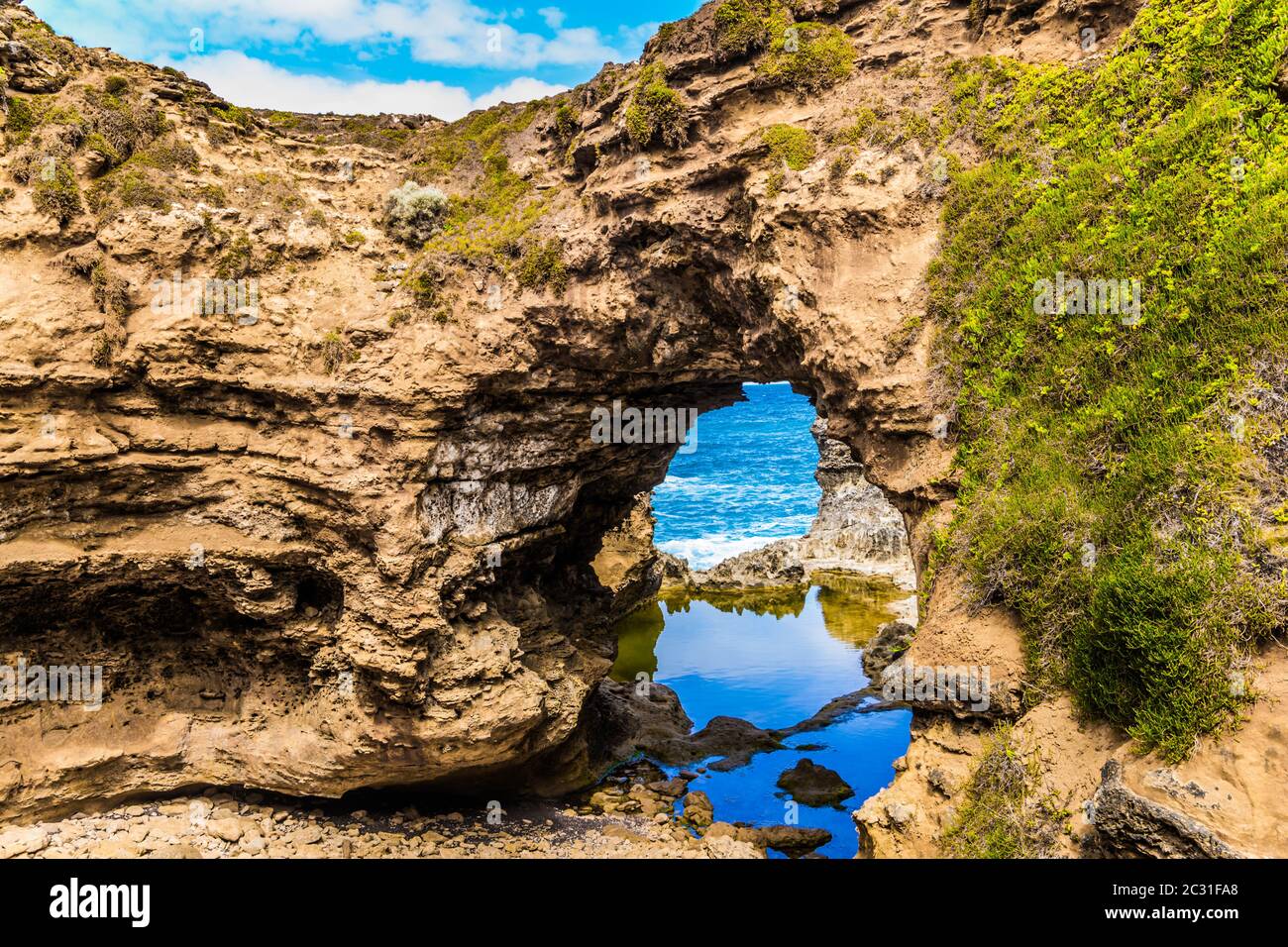 Quiet water in an arch Stock Photo - Alamy