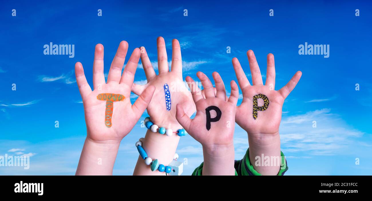Children Hands Building Colorful German Word Tipp Means Tip. Blue Sky ...