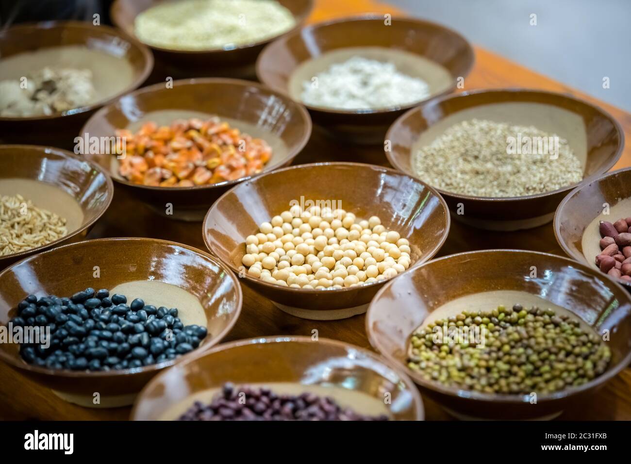 Variety of grains for sale Stock Photo - Alamy