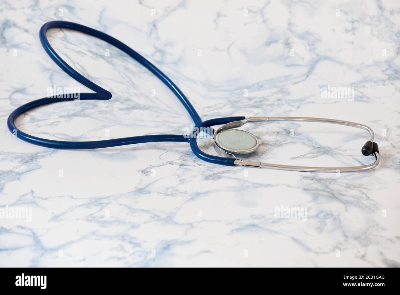 A stethoscope in the shape of a heart Stock Photo - Alamy