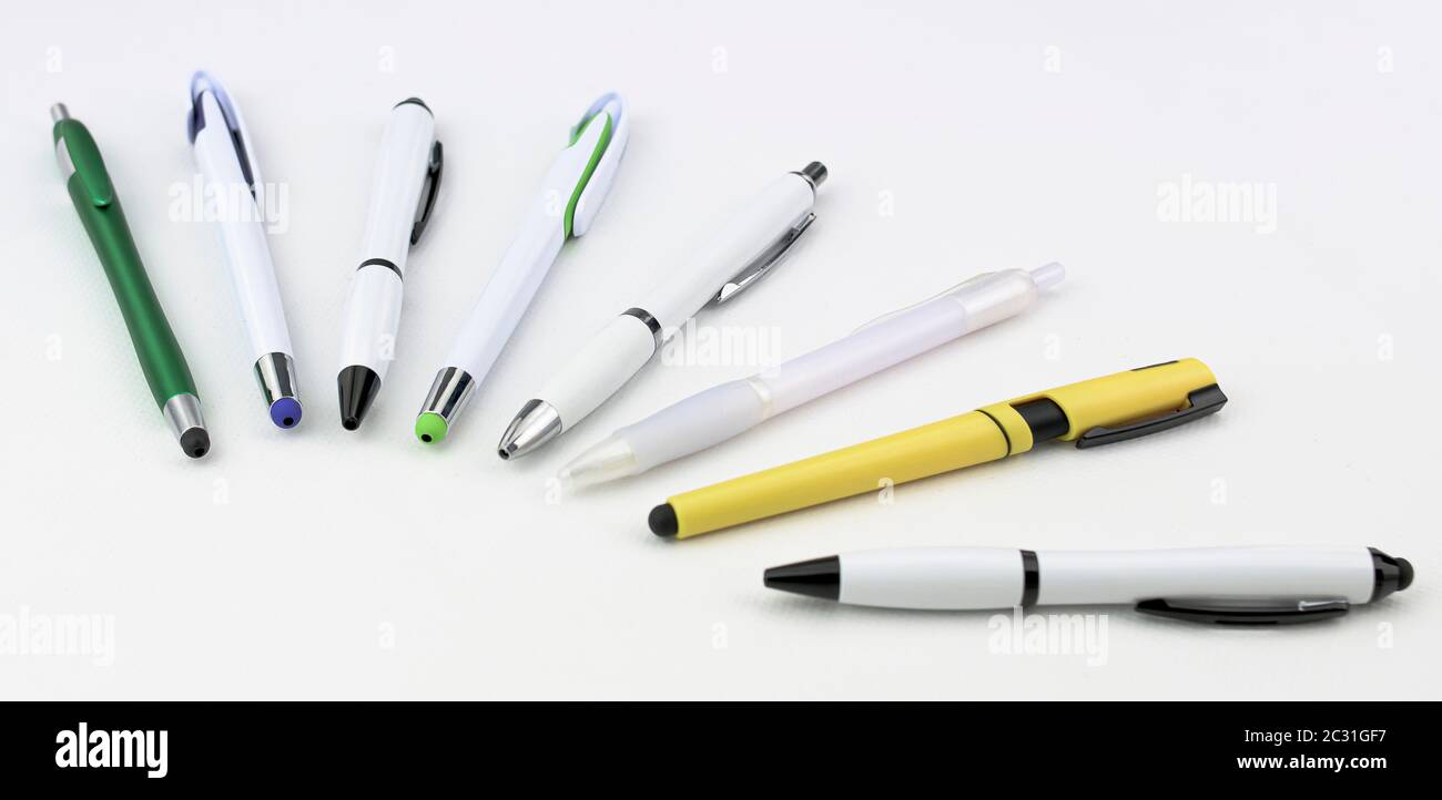 Aligned pens of different styles and colors on white background Stock ...