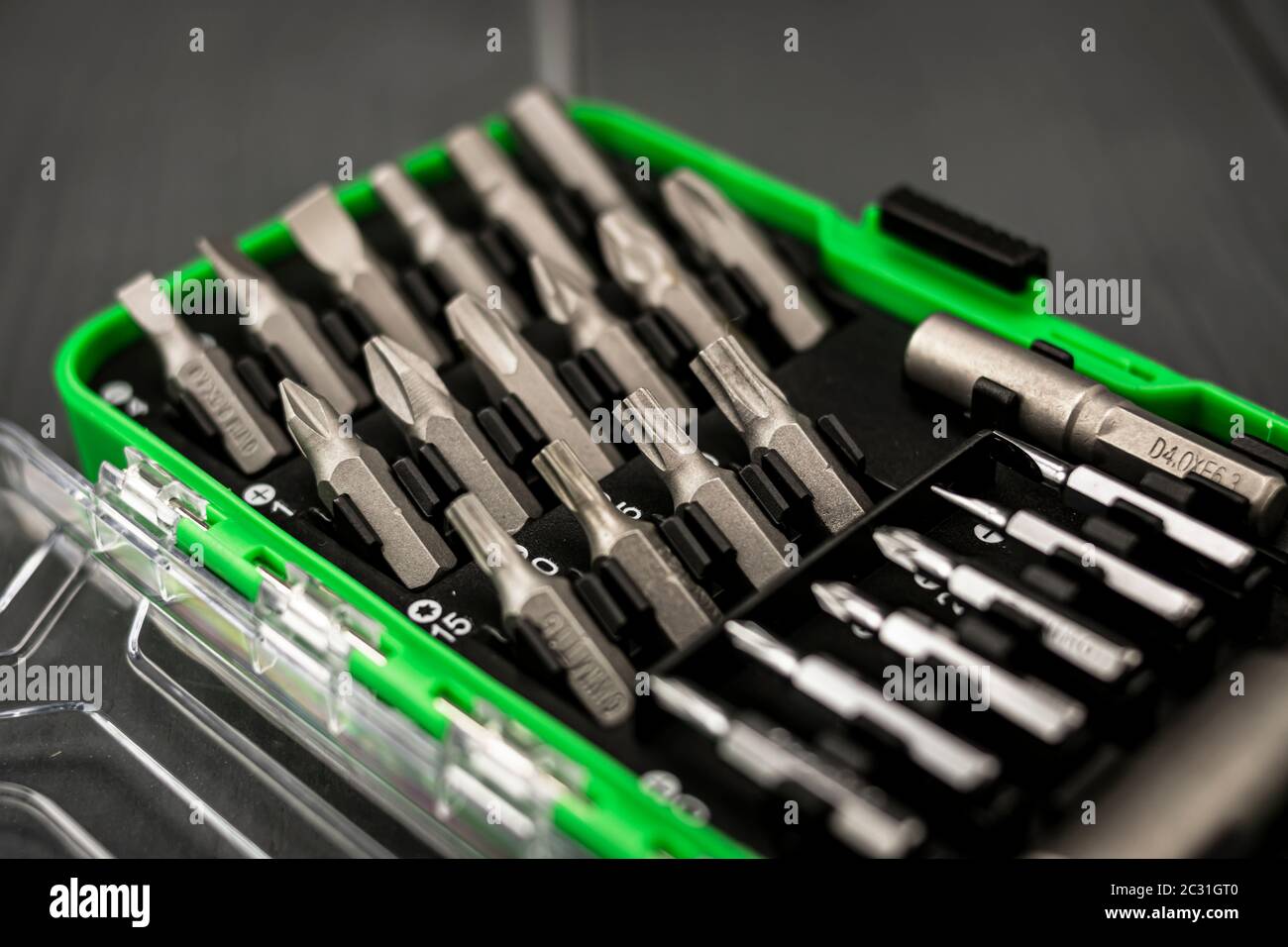 Plastic toolbox with interchangeable screwdriver tips of different ...