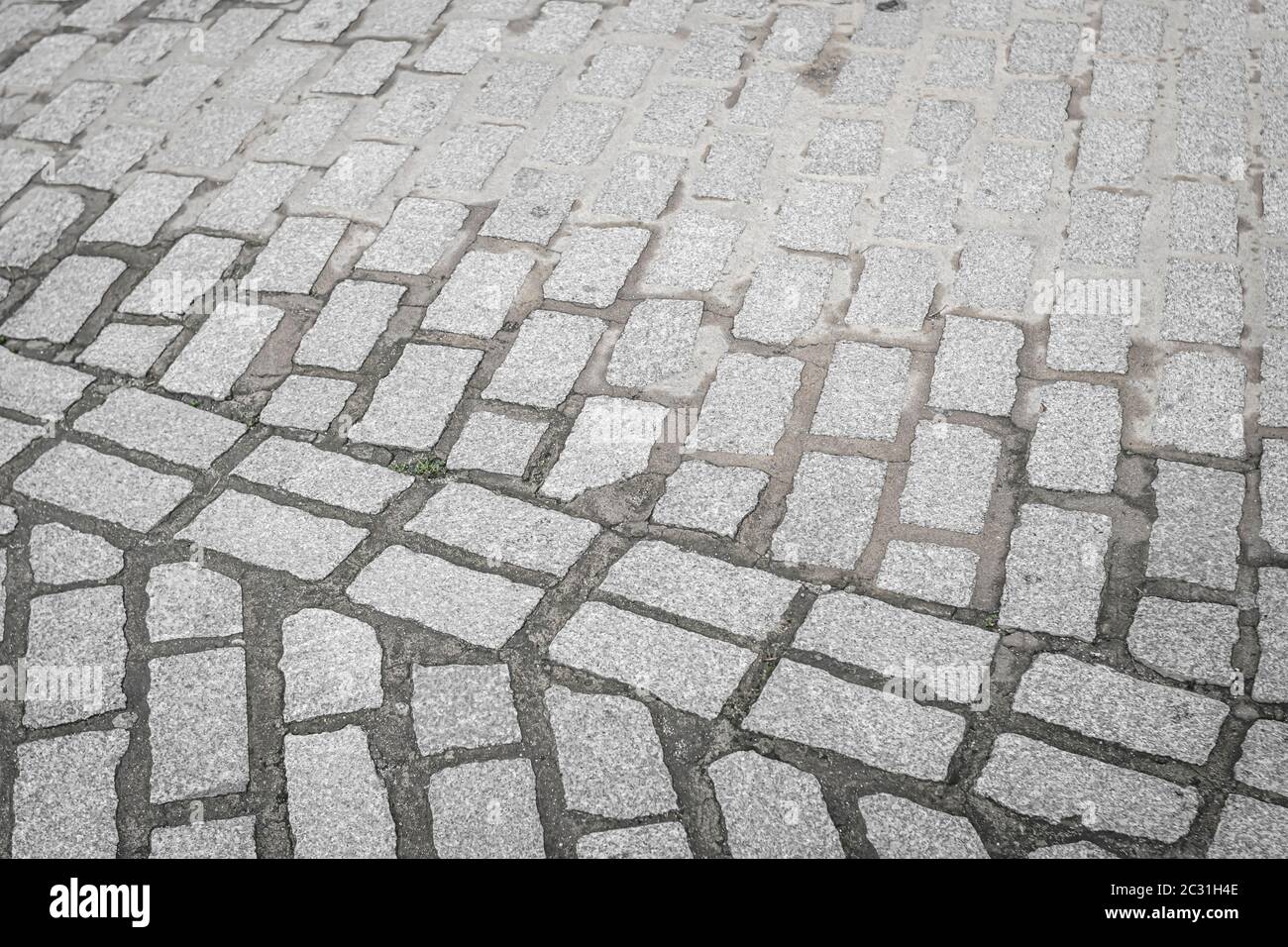 Stone pavers placed in different arrangement in a street of a Spanish ...