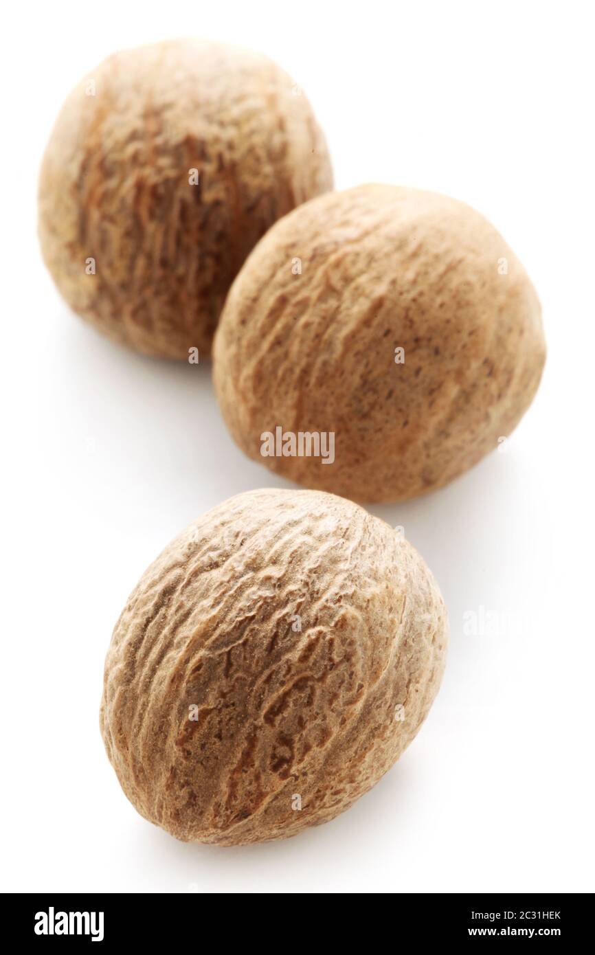 Whole nutmeg nutmegs Cut Out Stock Images & Pictures - Alamy