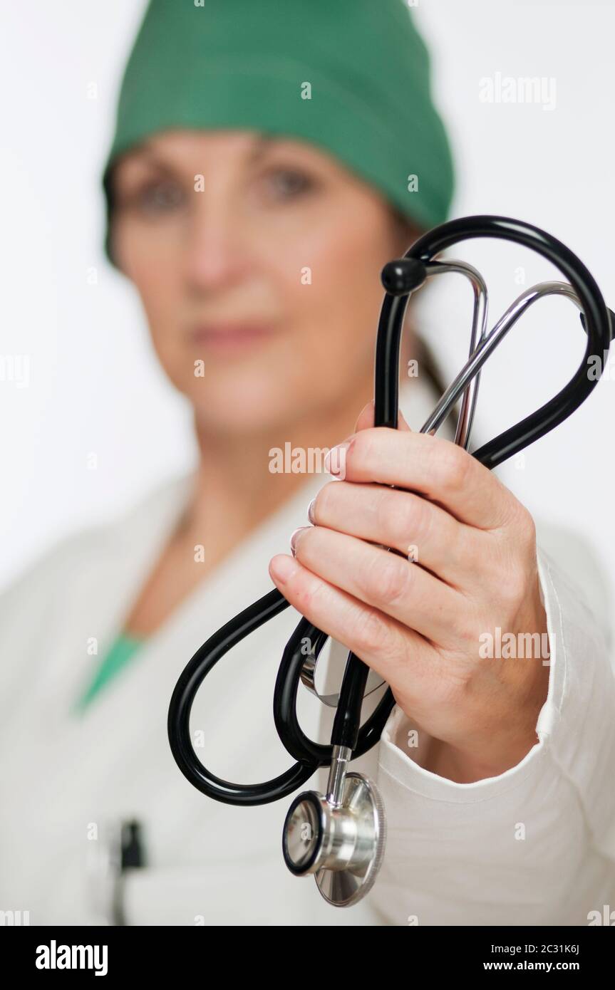 Blurred head-and-shoulders portrait of a female doctor in the ...
