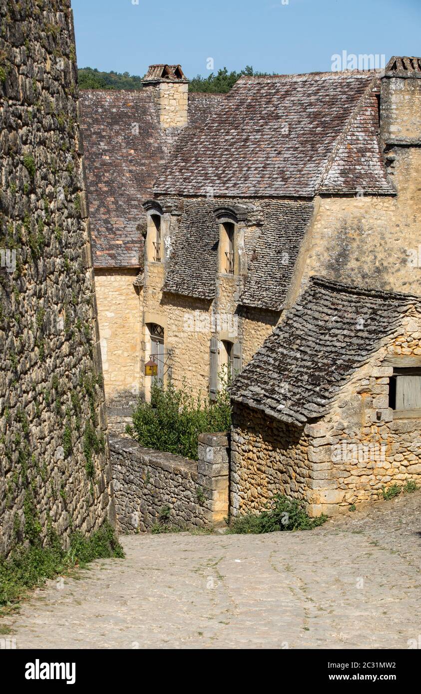 Typical French townscape with ancient housest and cobblestone street in ...