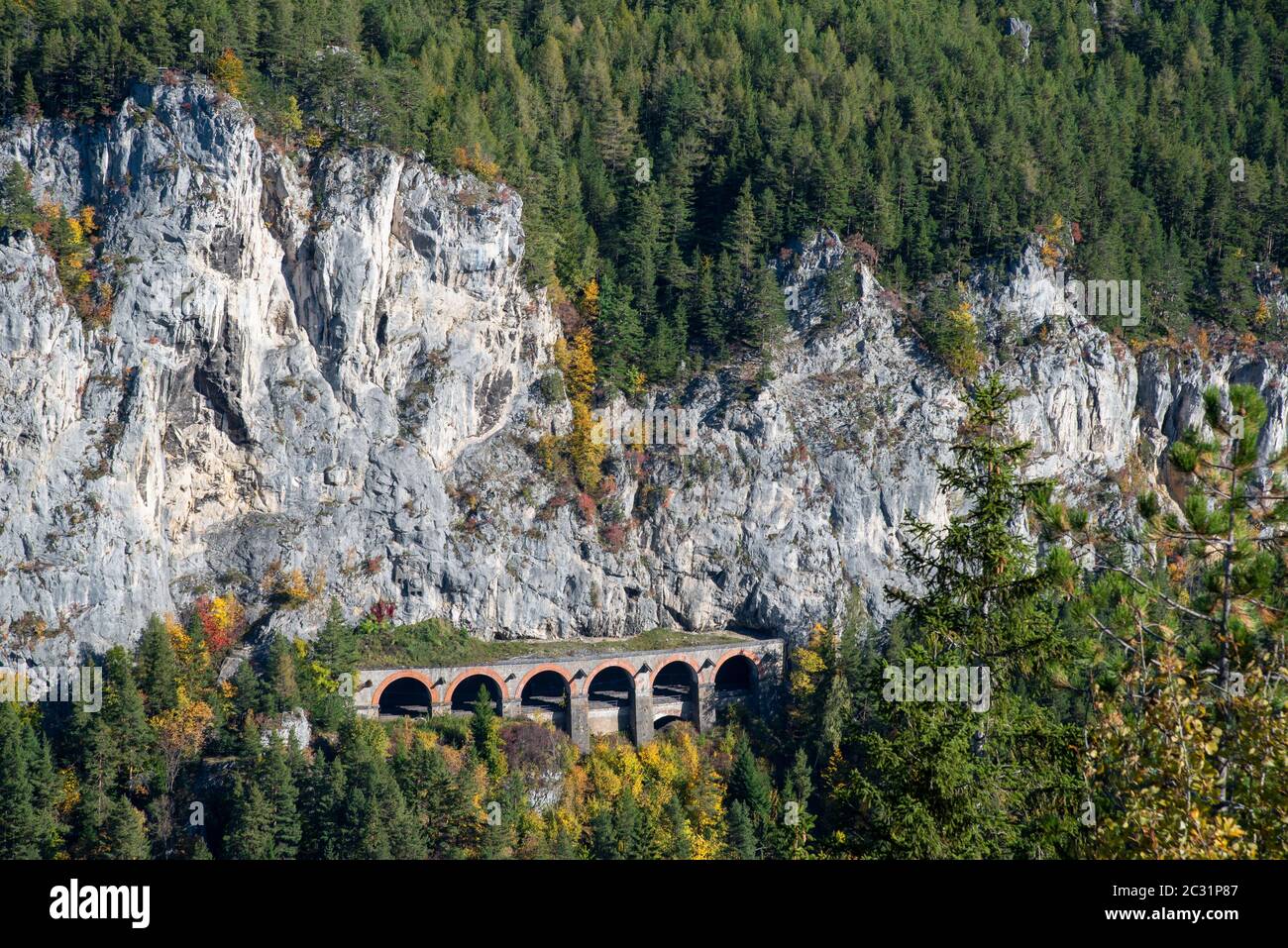 Viaduct and tunnel on the Semmering Railway. The Semmering Railway is ...